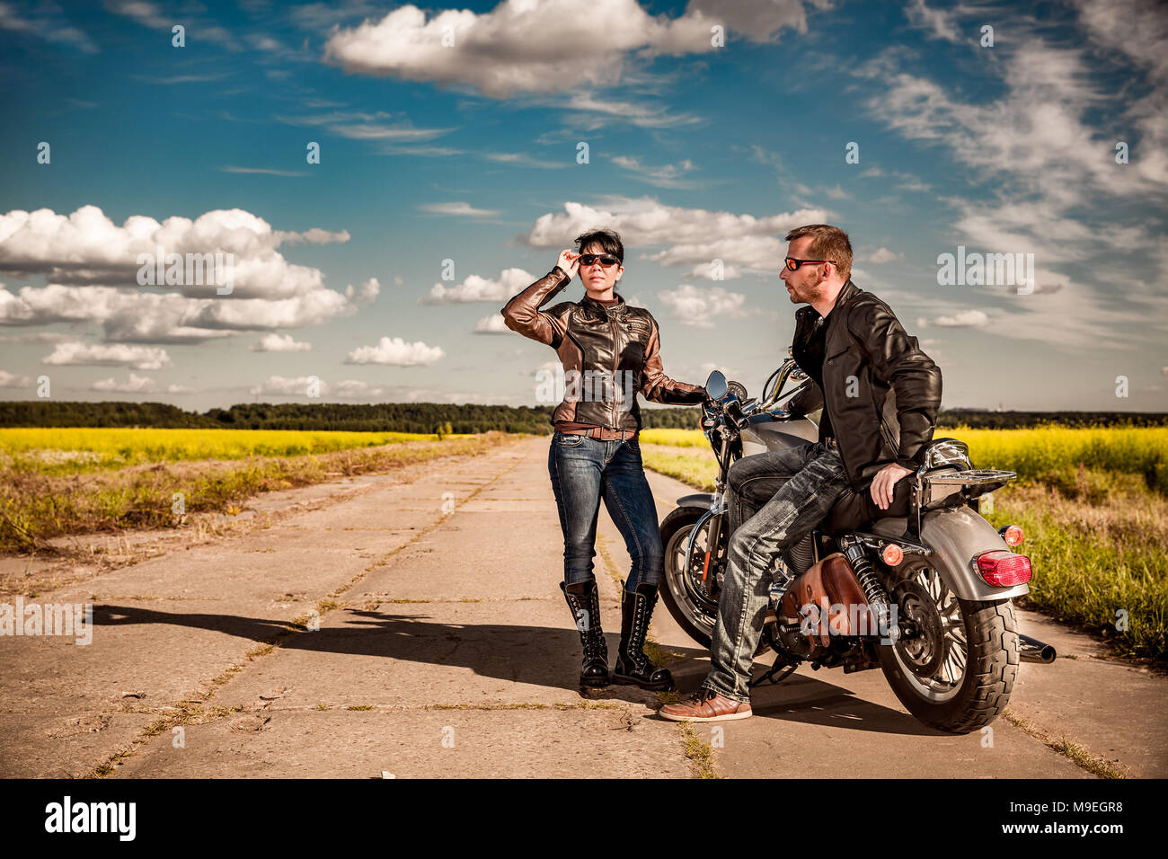 Couple riding motorcycle city hi-res stock photography and images - Alamy