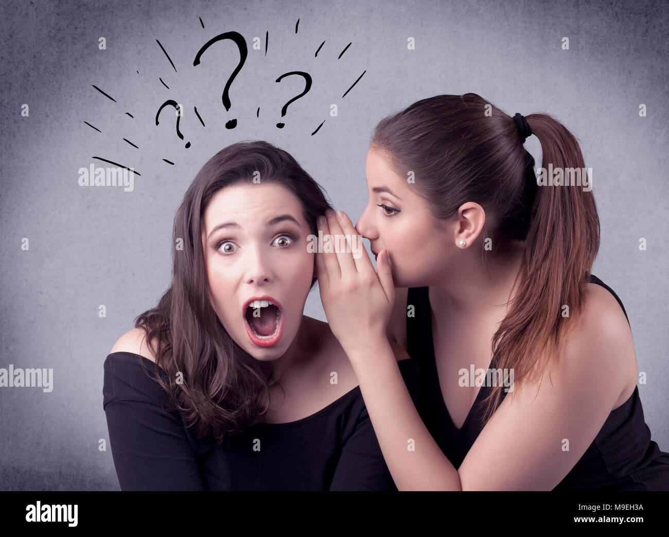 A teenager girl looking confused with drawn question marks above the ...