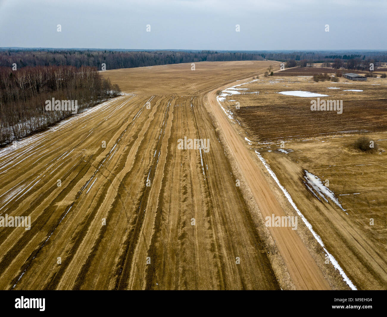 drone image. aerial view of rural area with fields in early spring ...