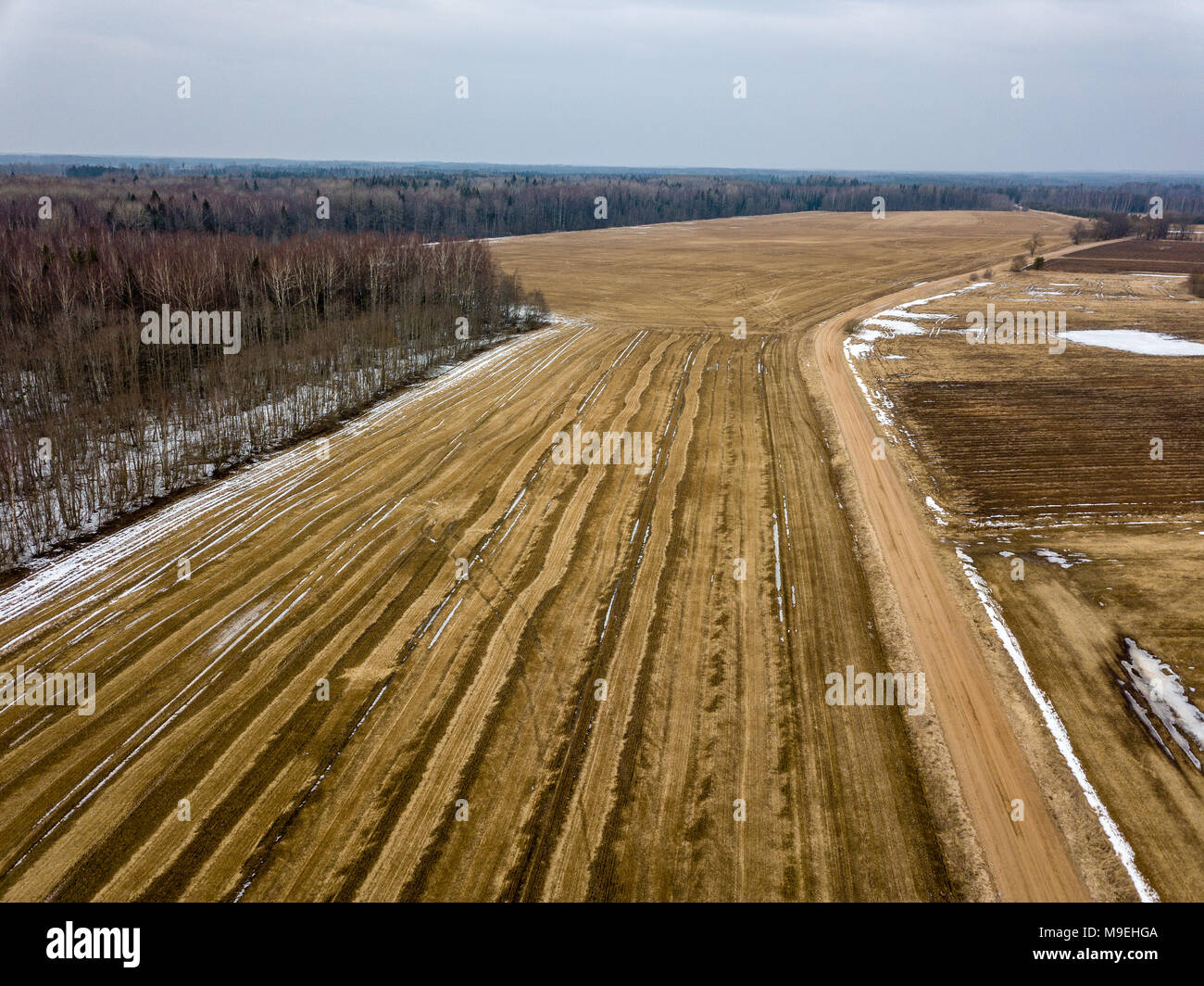 drone image. aerial view of rural area with fields in early spring ...