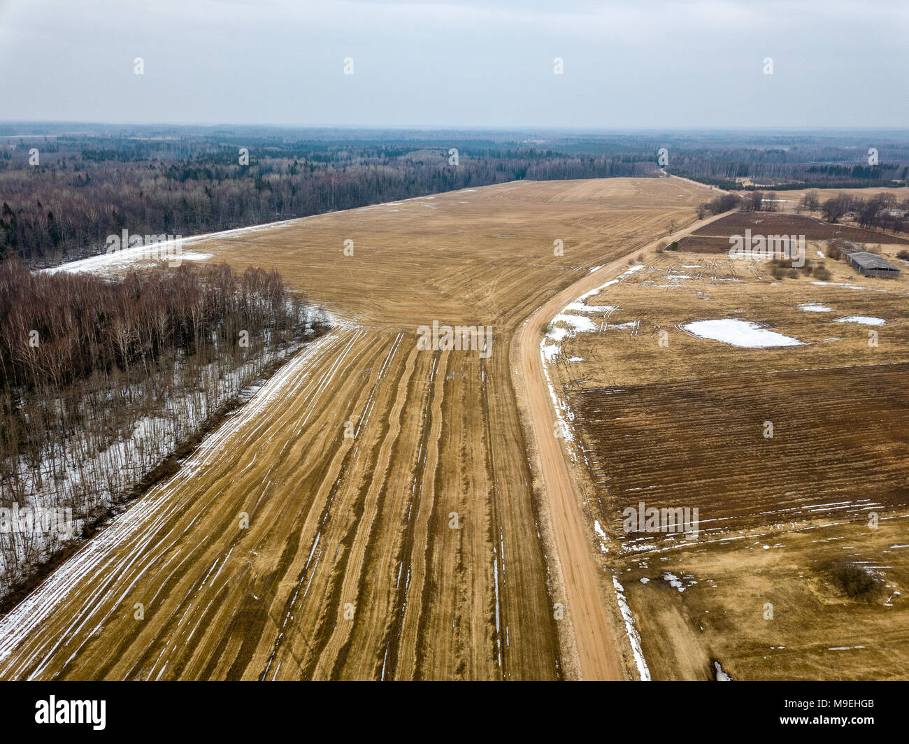 drone image. aerial view of rural area with fields in early spring ...
