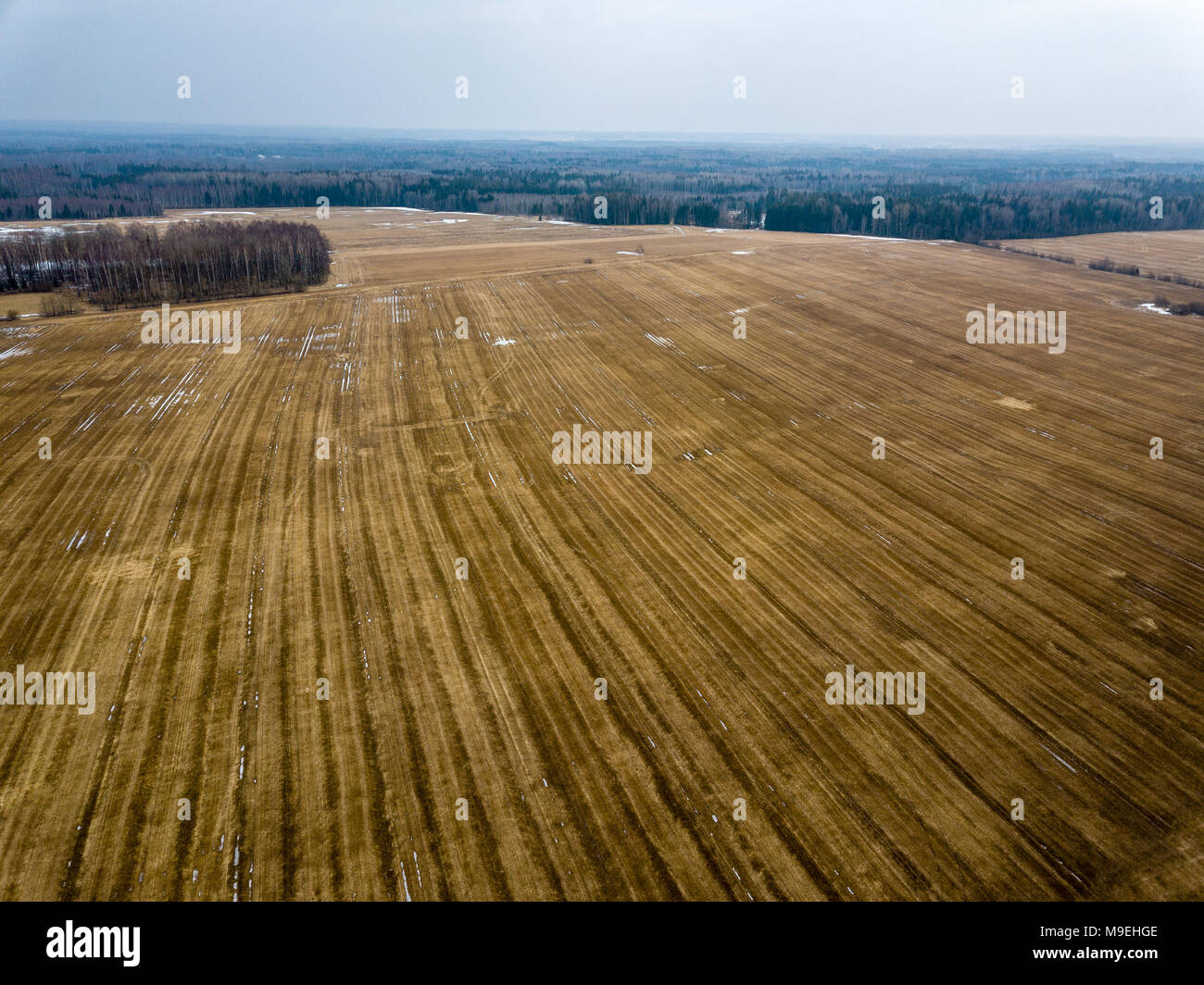 drone image. aerial view of rural area with fields in early spring ...