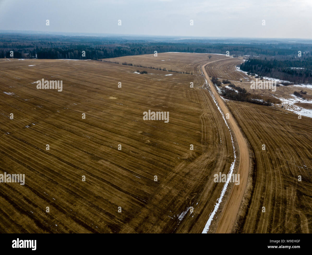 drone image. aerial view of rural area with fields in early spring ...