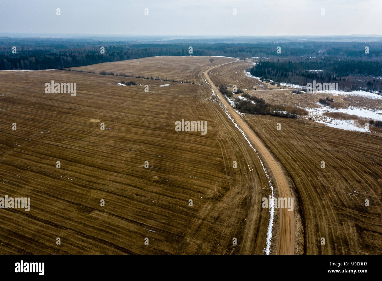 drone image. aerial view of rural area with fields in early spring ...