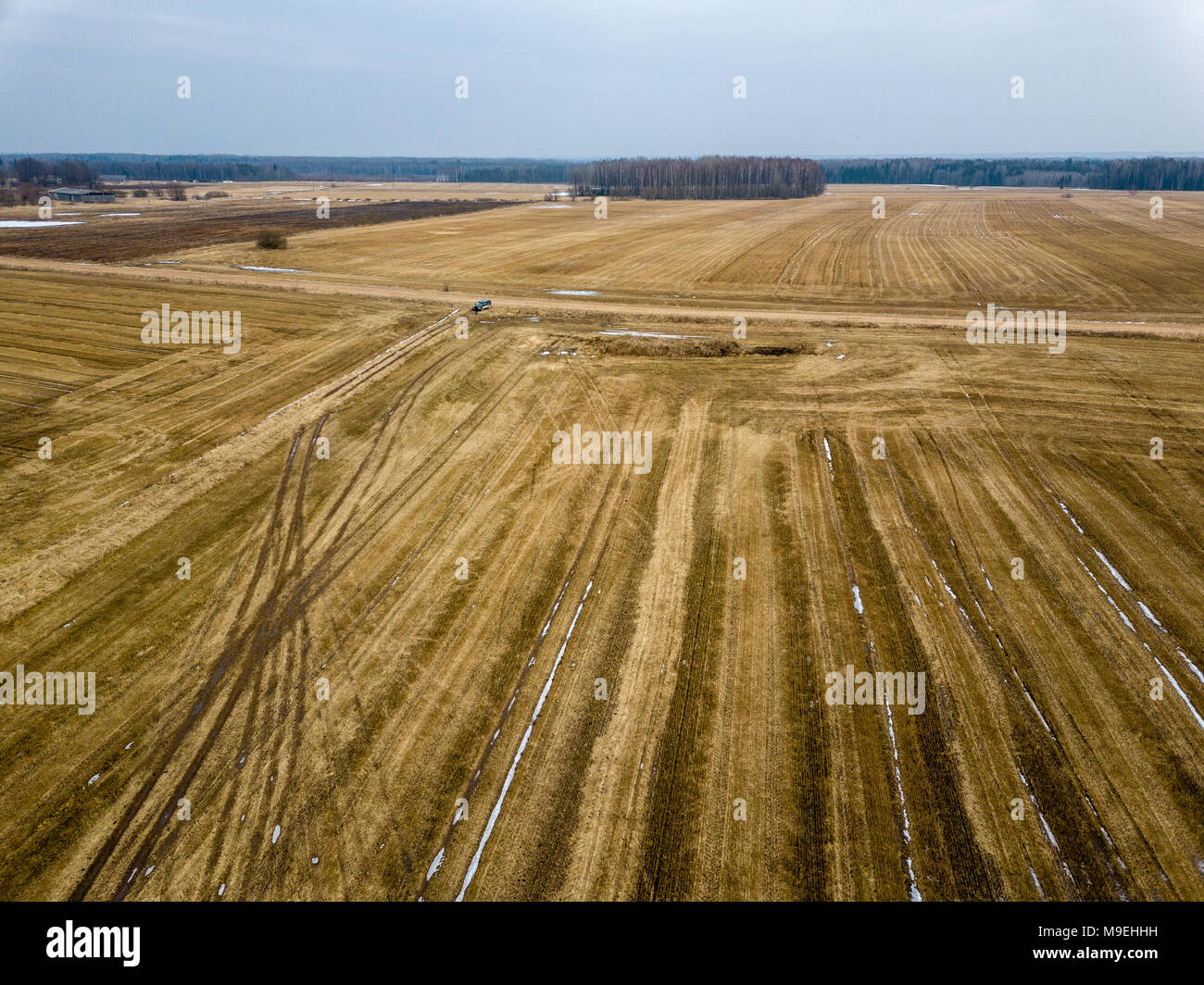 drone image. aerial view of rural area with fields in early spring ...
