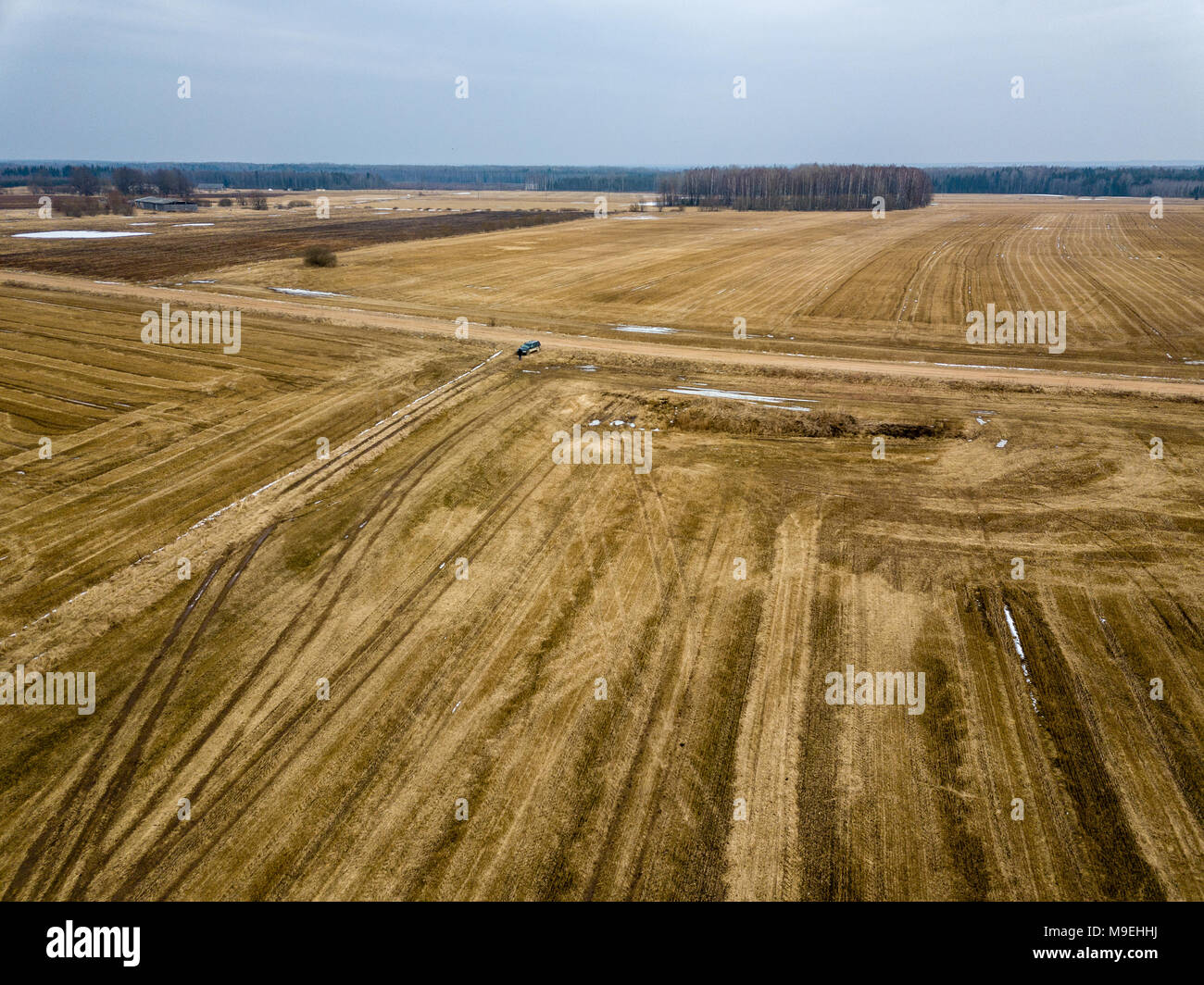 drone image. aerial view of rural area with fields in early spring ...