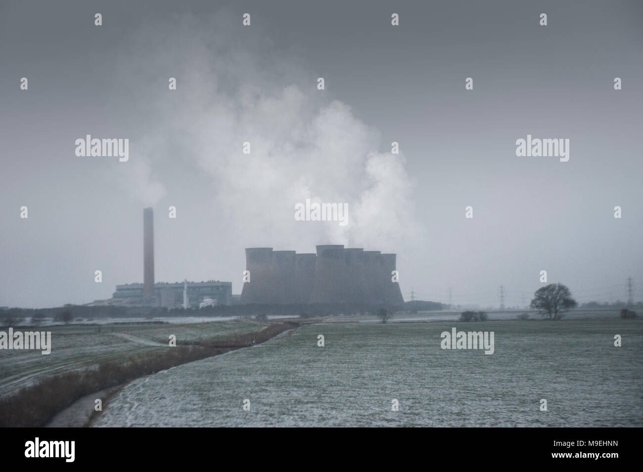 Snowy fields surround a grim looking Eggborough Power Station on a drab ...