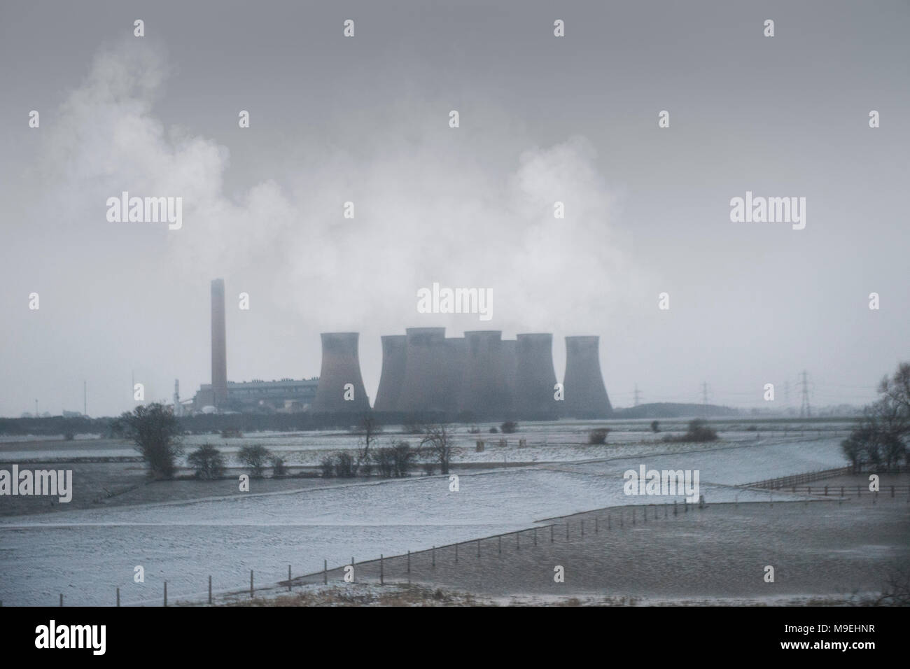 Snowy fields surround a grim looking Eggborough Power Station on a drab ...