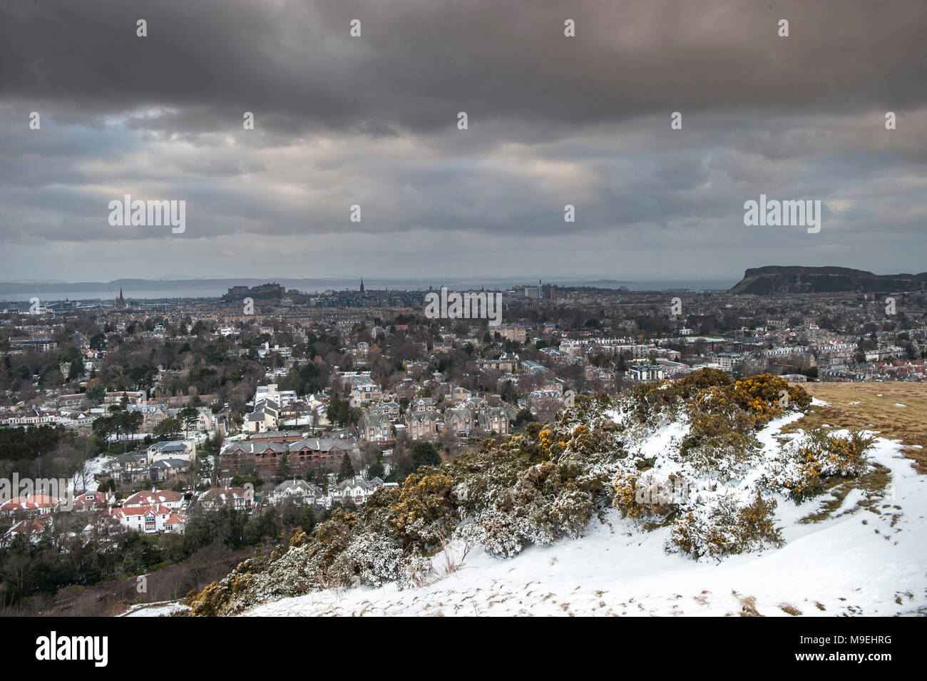 A view from high above Edinburgh in half light with Edinburgh Castle ...