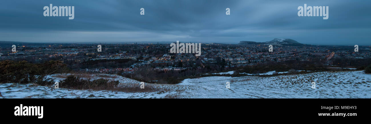A view from high above Edinburgh in half light with Edinburgh Castle ...