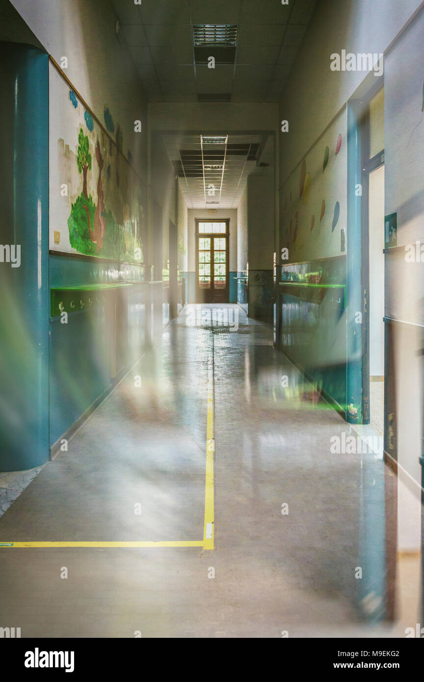 Internal room of old and abandoned devastated school in double ...