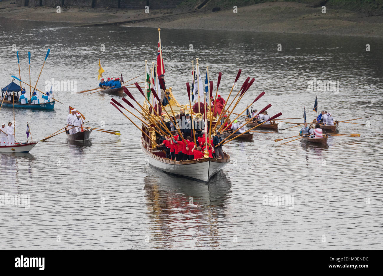 London, UK. 24th March 2018. Gloriana, the Queen's row barge, escorted ...