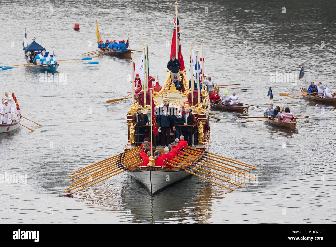 London, UK. 24th March 2018. Gloriana, the Queen's row barge, escorted ...