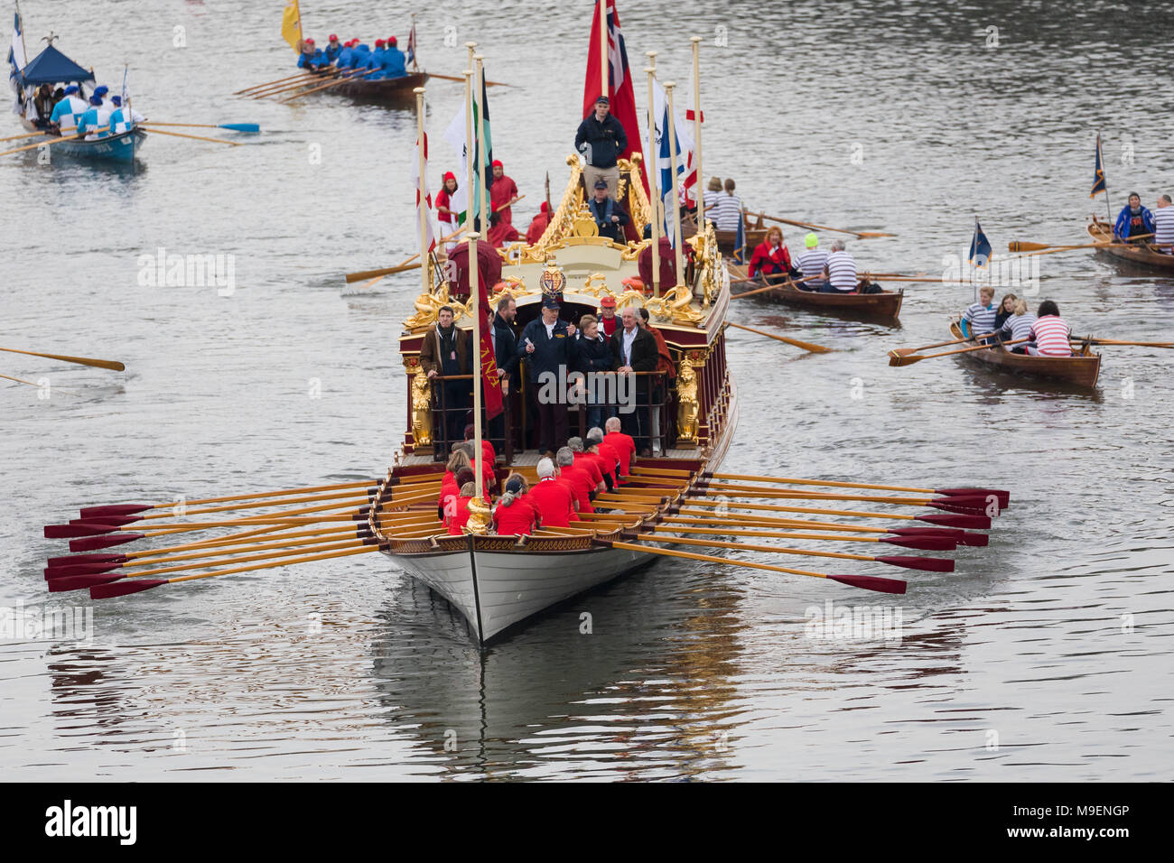 London, UK. 24th March 2018. Gloriana, the Queen's row barge, escorted ...