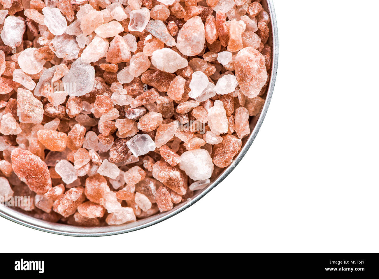 Himalayan salt cristals seeds in pot isolated on white Stock Photo - Alamy