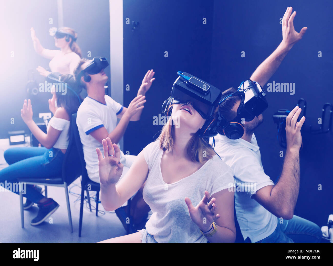 Young people try virtual reality with the help of 3d goggles Stock ...