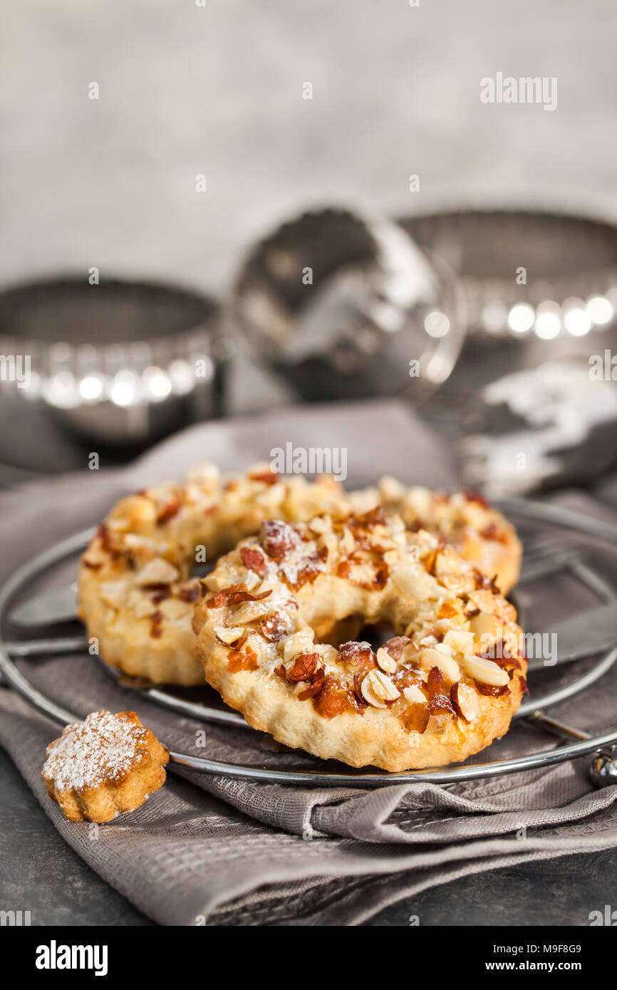 Ring shortbread cookies with peanuts on top Stock Photo - Alamy