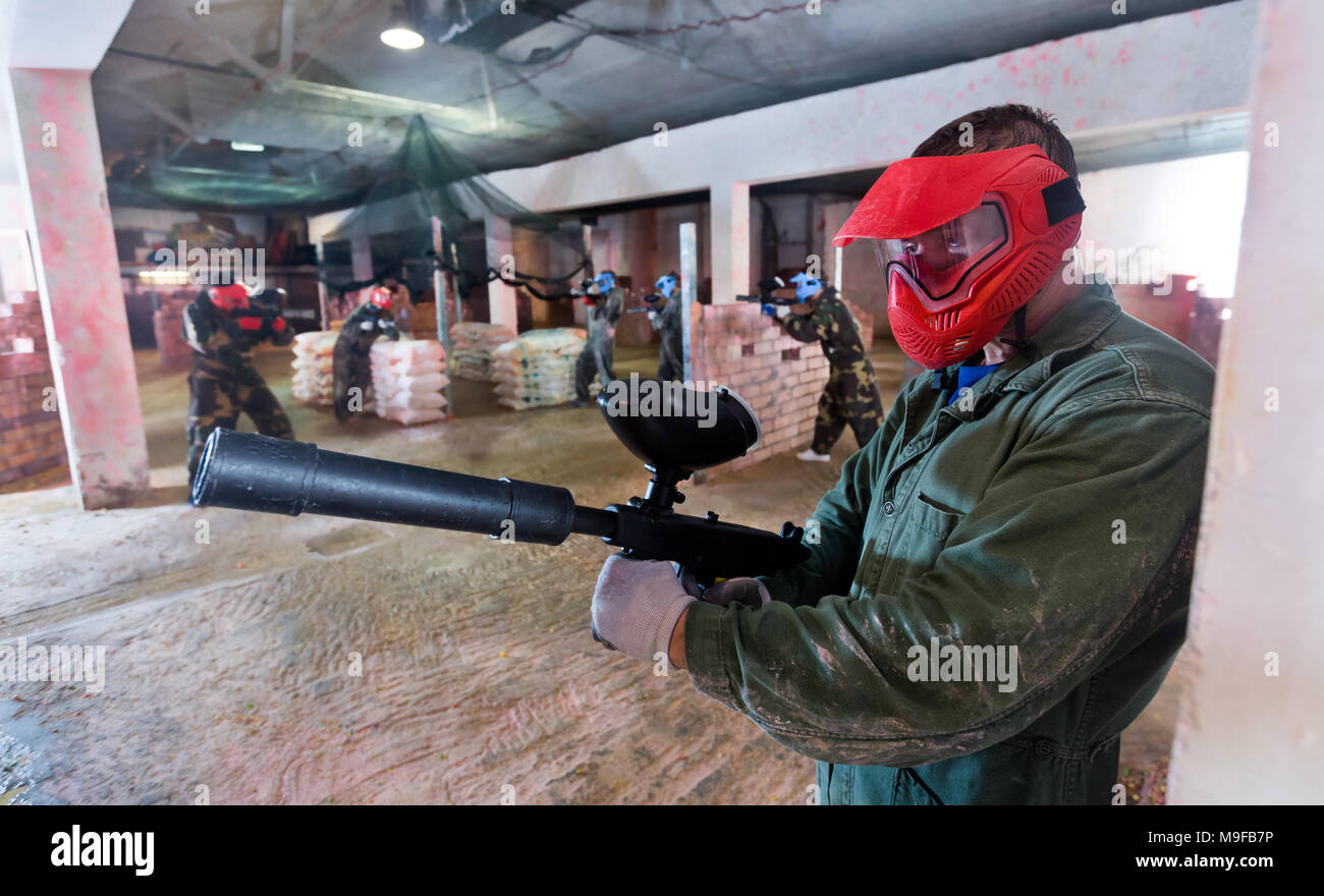 Player in red mask is targeting in enemy in battlefield in the ...