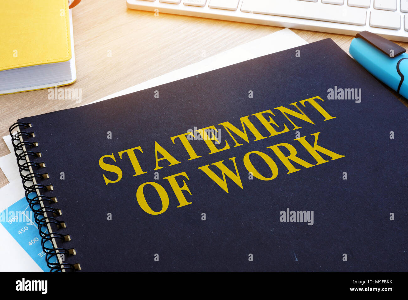 Statement of Work SOW on an office desk Stock Photo - Alamy