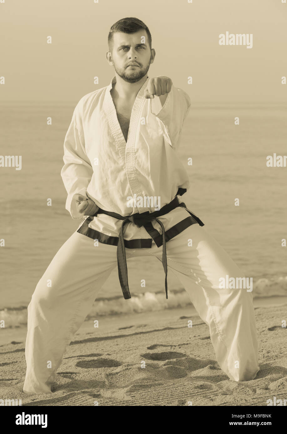 Man jumping sky taekwondo hi-res stock photography and images - Alamy
