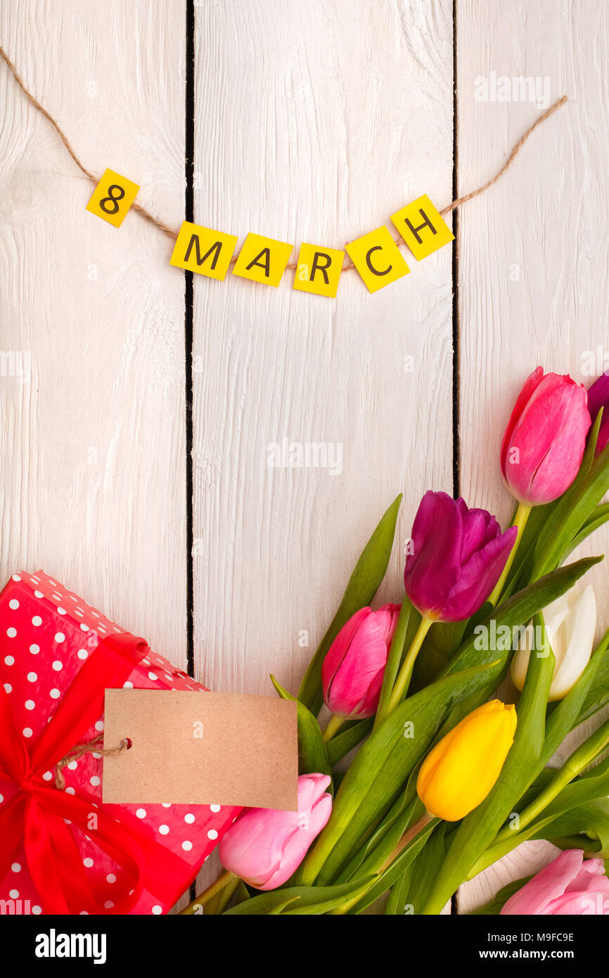Spring traditional objects gifts isolated on wooden floor vertical ...