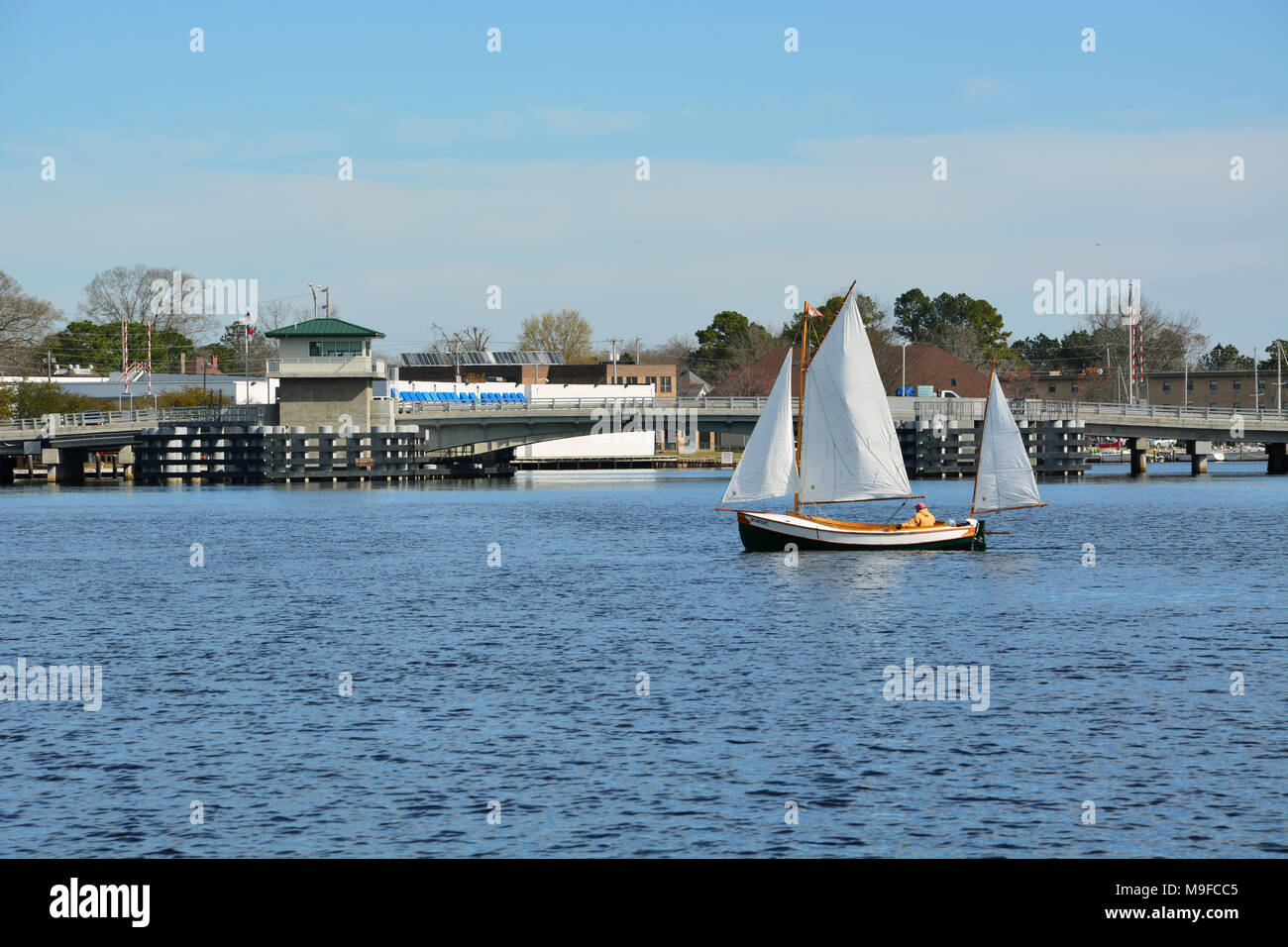 A small sailboat on the Elizabeth City waterfront where the Pasquotank River meets the Albemarle ...