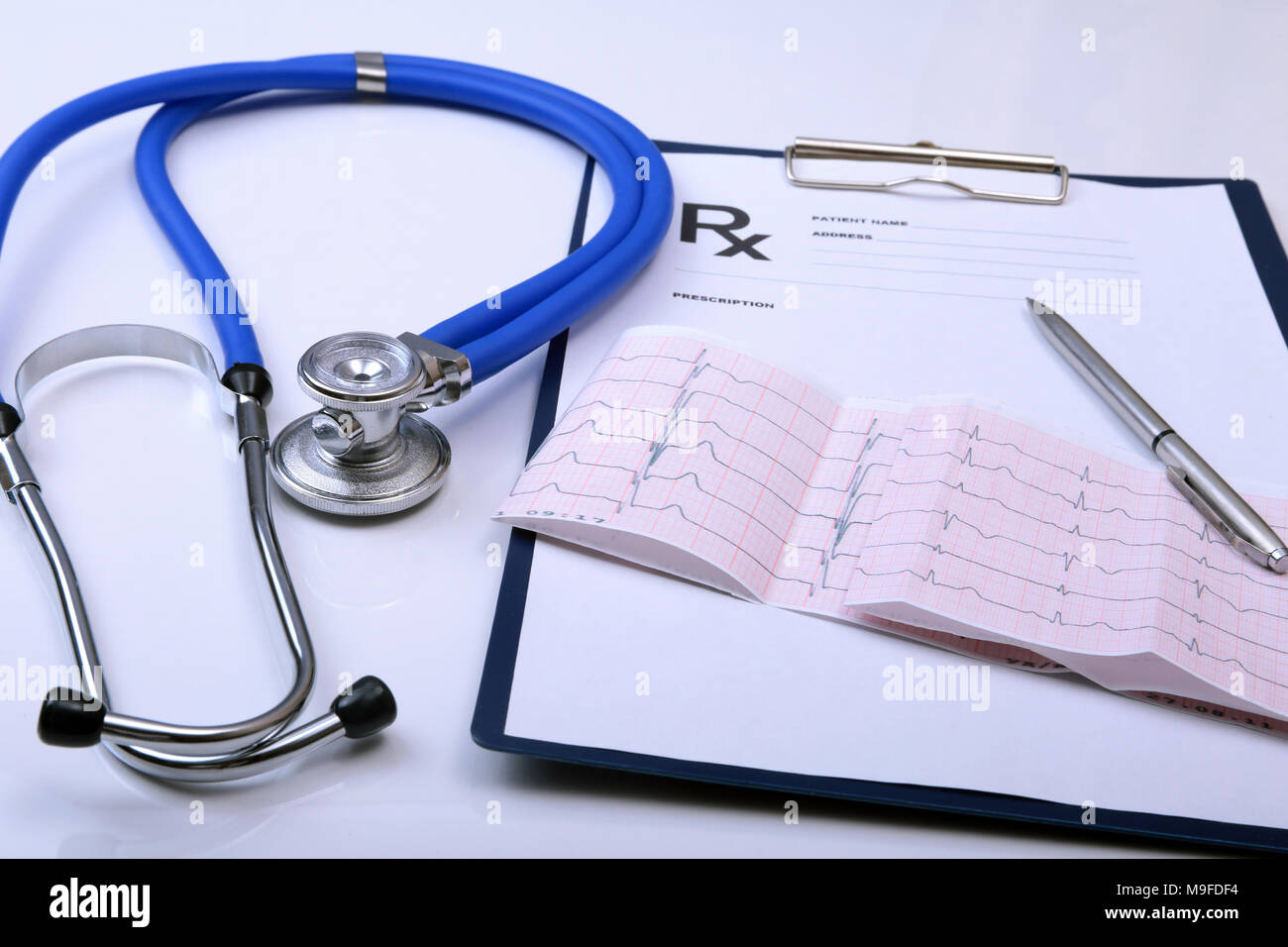 RX prescription, pen and a stethoscope isolated on white background ...