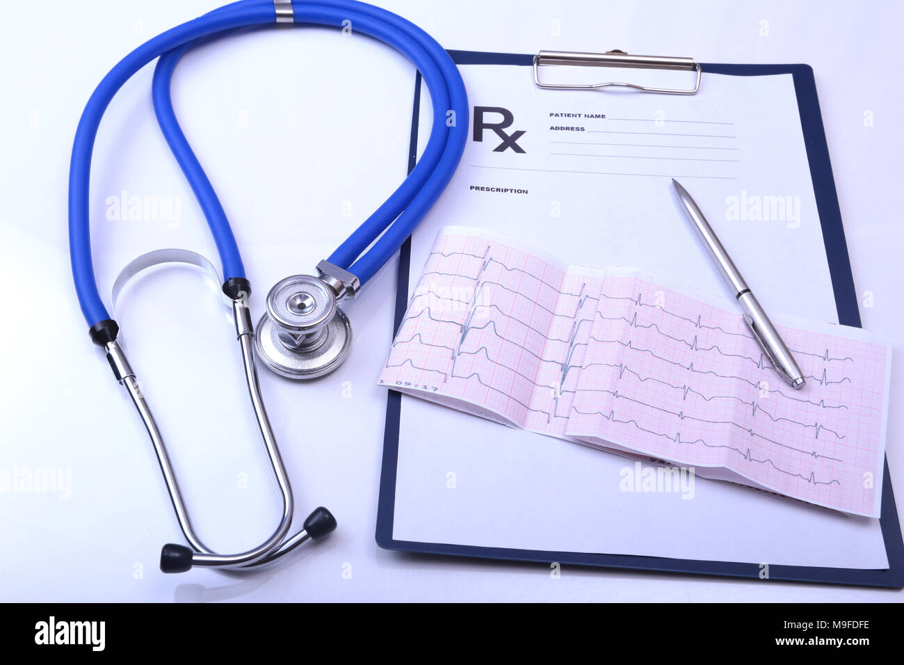 RX prescription, pen and a stethoscope isolated on white background ...
