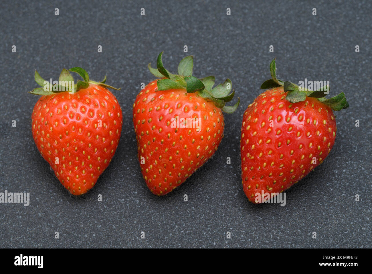 Red color fruit hi-res stock photography and images - Alamy