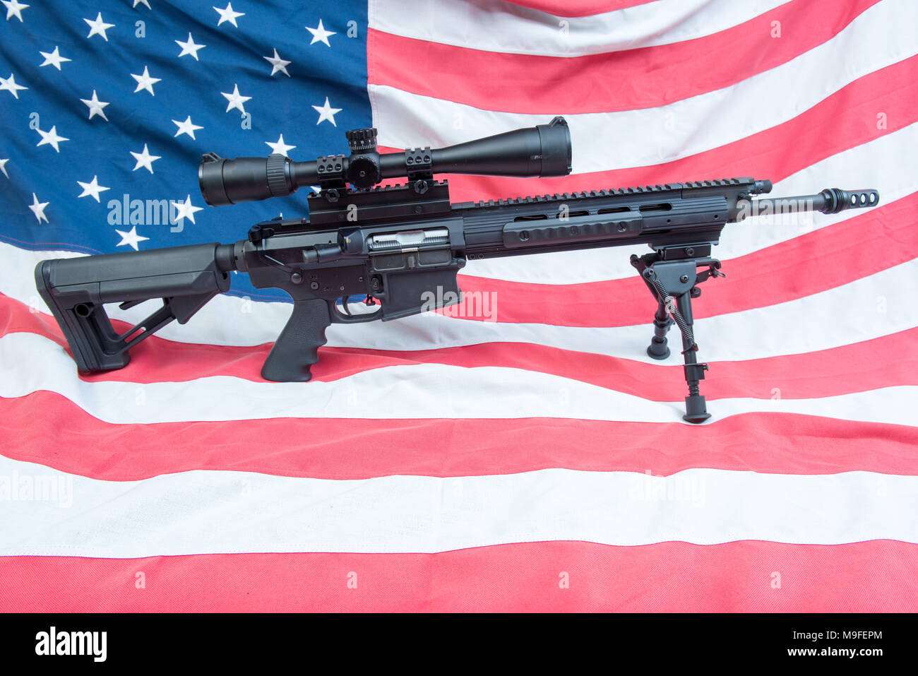 Pistol on usa flag hi-res stock photography and images - Alamy