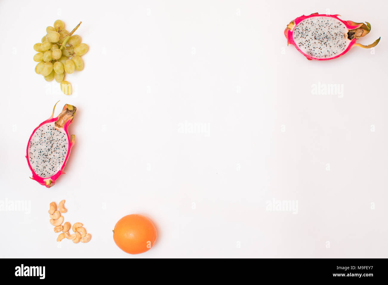 Exotic fruit. Creative layout made of , orange, papaya, dragon fruit ...