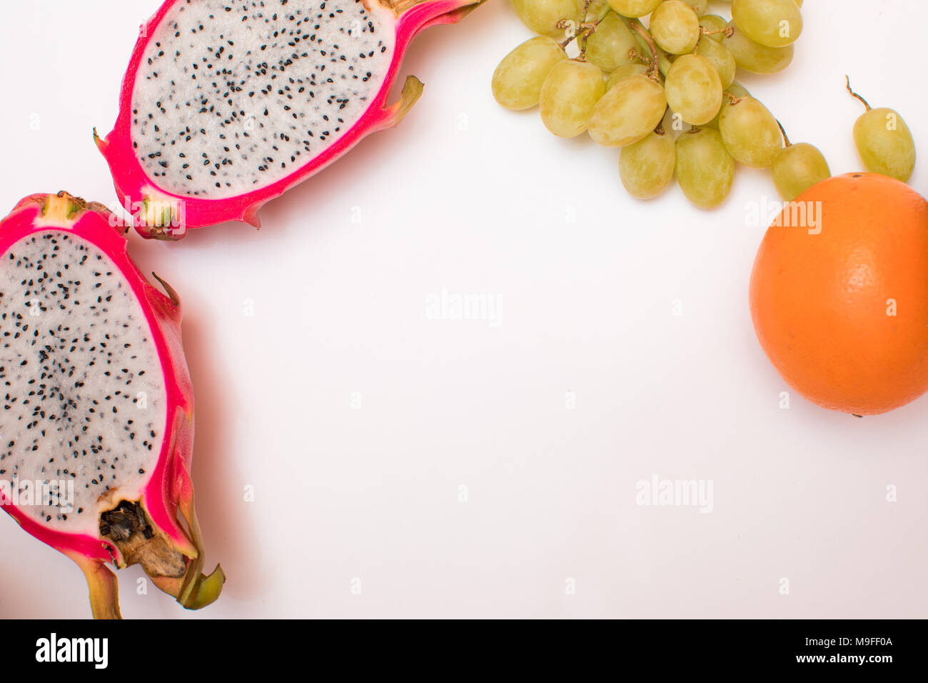 Exotic fruit. Creative layout made of , orange, papaya, dragon fruit ...