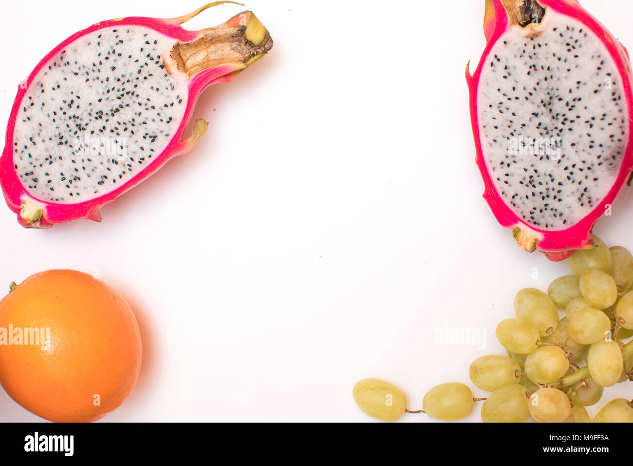 Exotic fruit. Creative layout made of , orange, papaya, dragon fruit ...