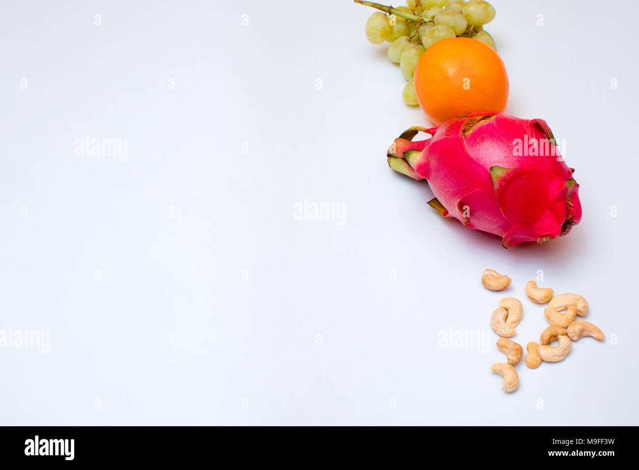 Exotic fruit. Creative layout made of , orange, papaya, dragon fruit ...