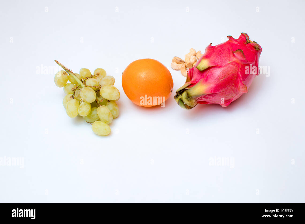 Exotic fruit. Creative layout made of , orange, papaya, dragon fruit ...