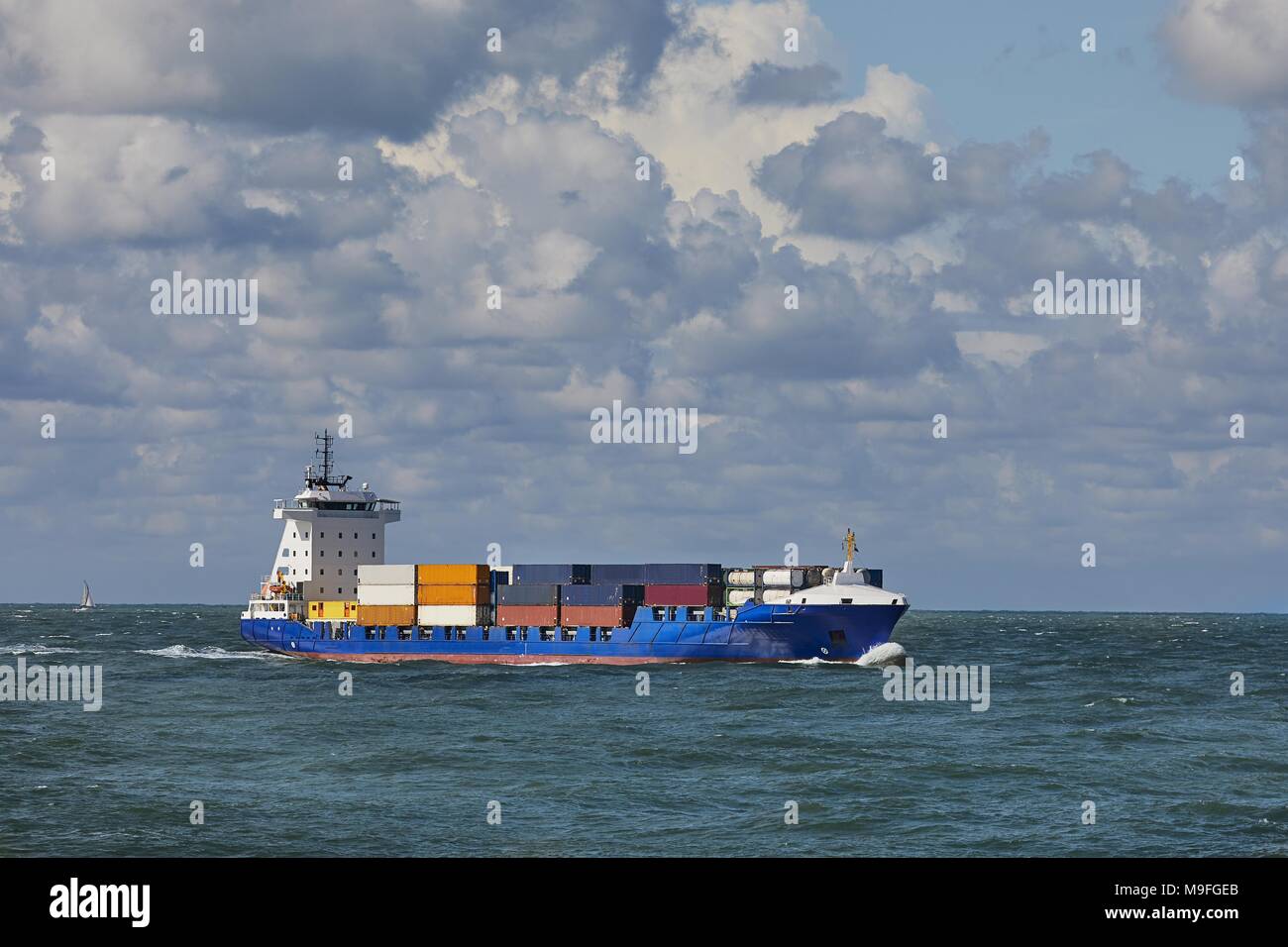 Ship carrying containers onboard Stock Photo - Alamy