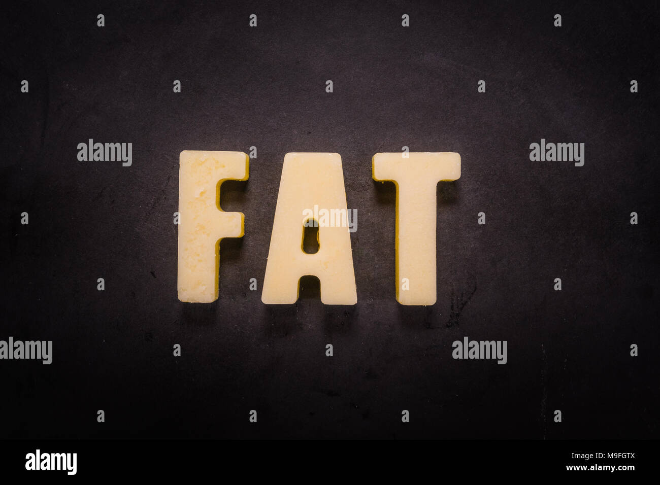 Butter Words Fat with vignette lighting over cast iron skillet Stock ...