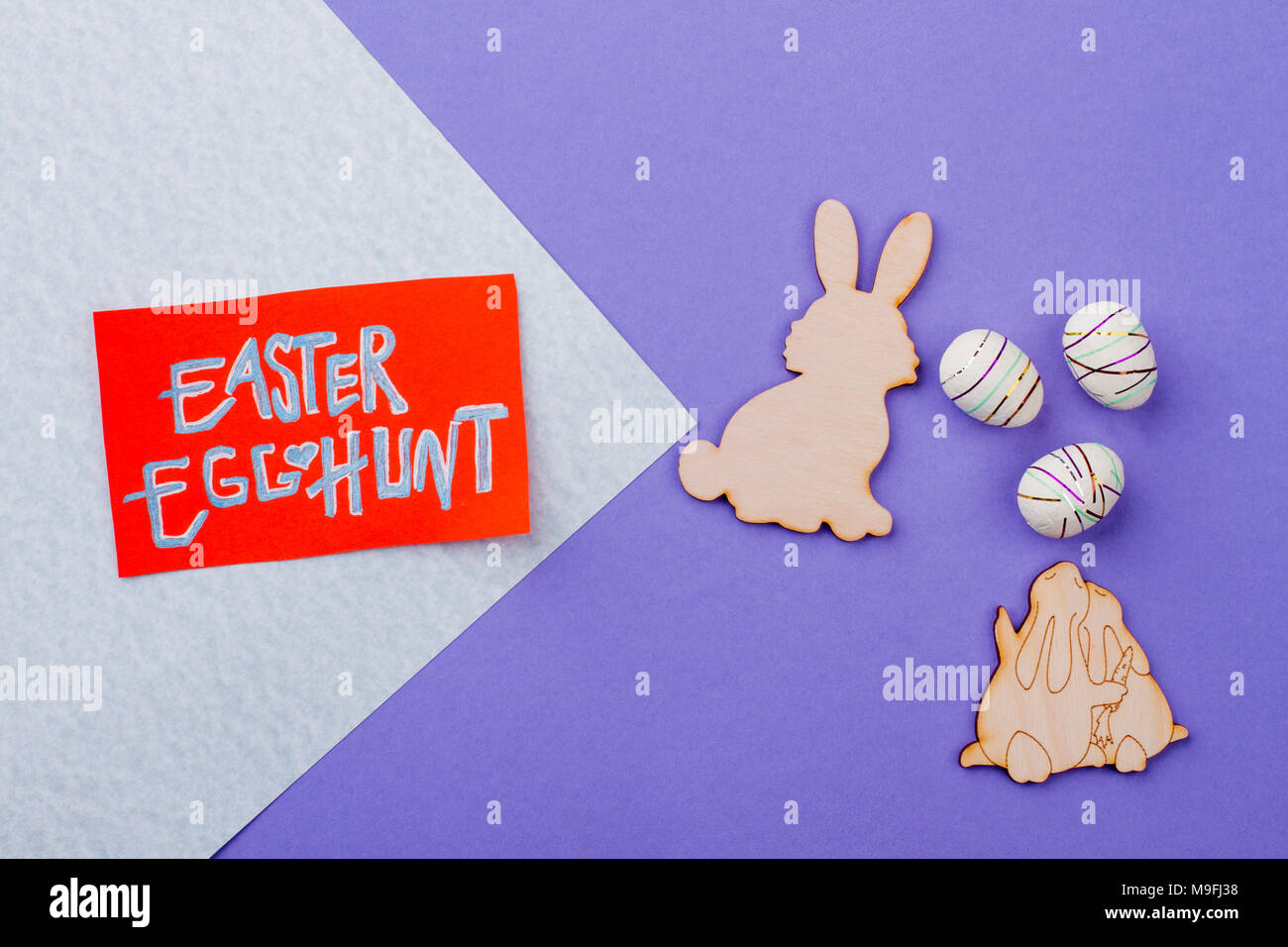Easter egg hunt text. Easter card, plywood rabbit cutouts and styrofoam ...