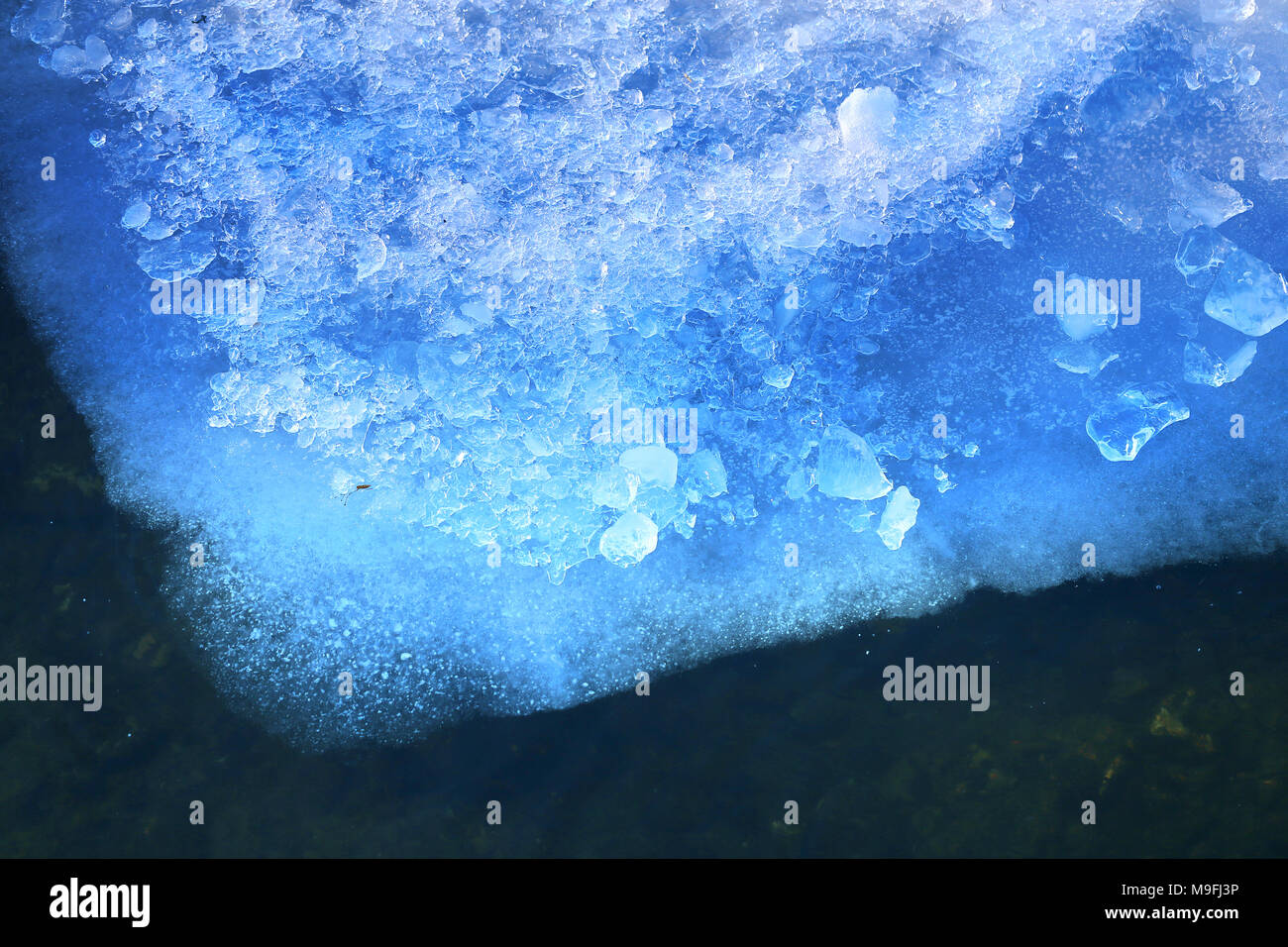 Photo of a super background macro of ice floes and water of bright ...