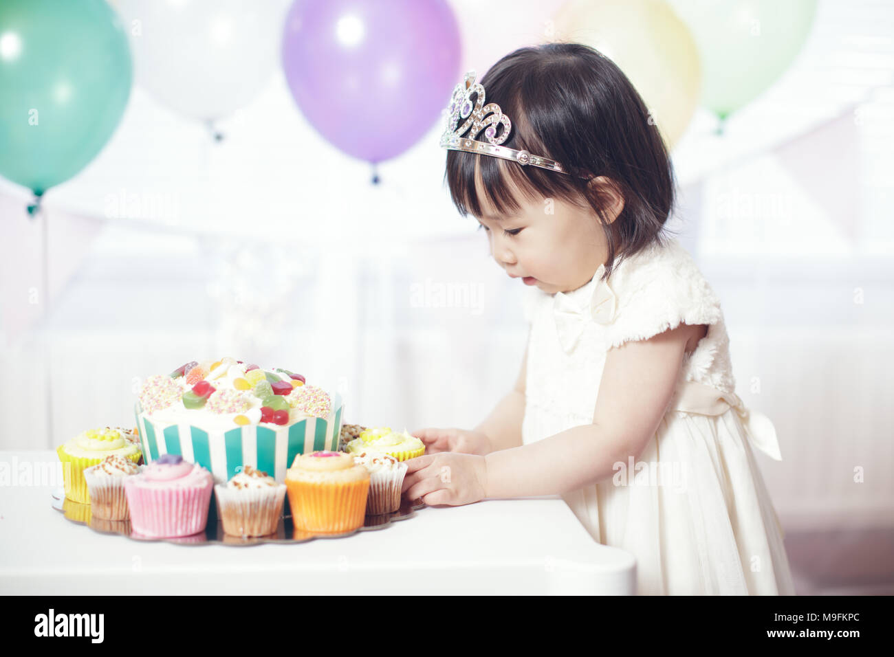Baby girl celebrate her second birthday Stock Photo - Alamy
