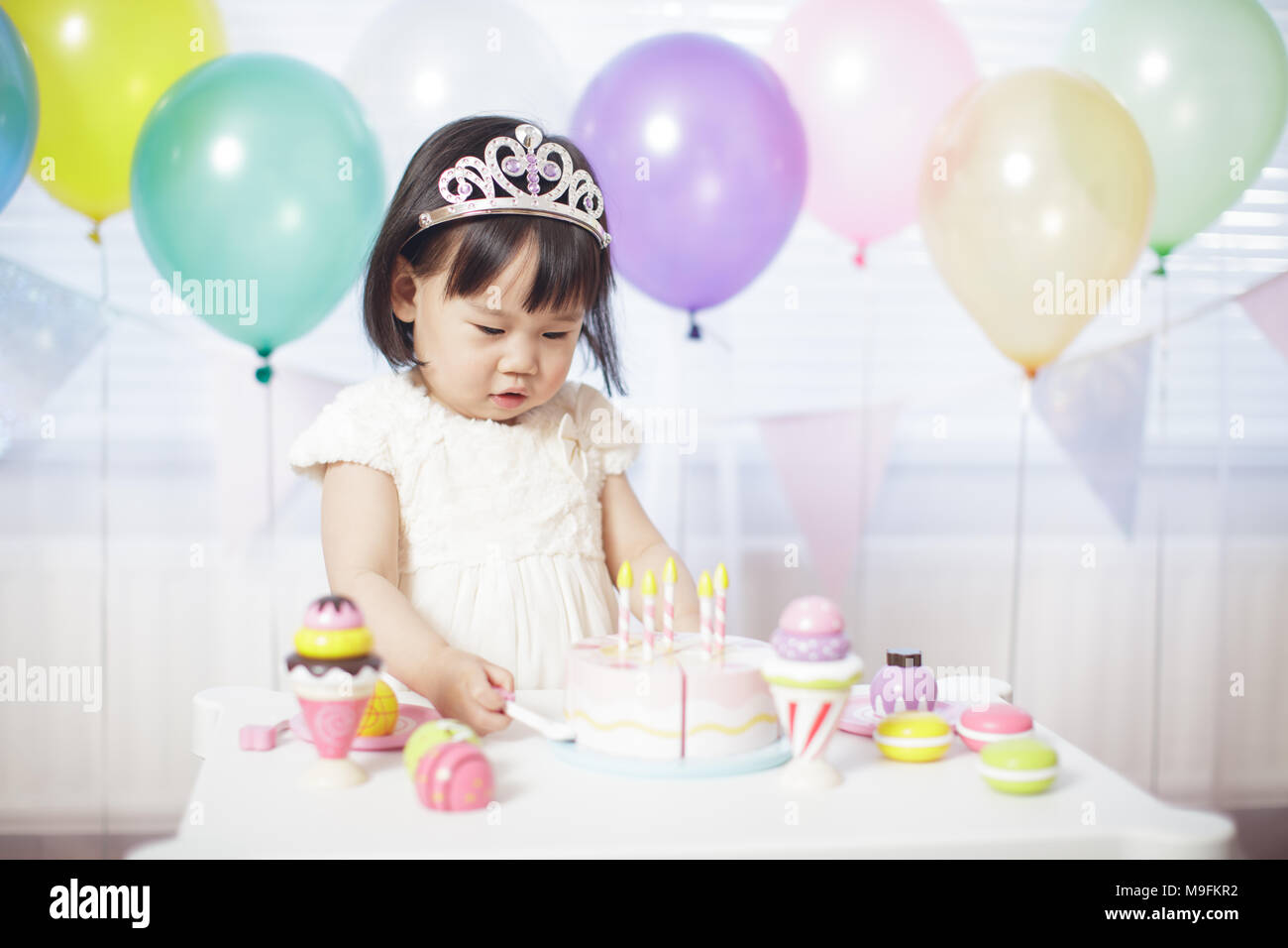 Baby girl celebrate her second birthday Stock Photo - Alamy