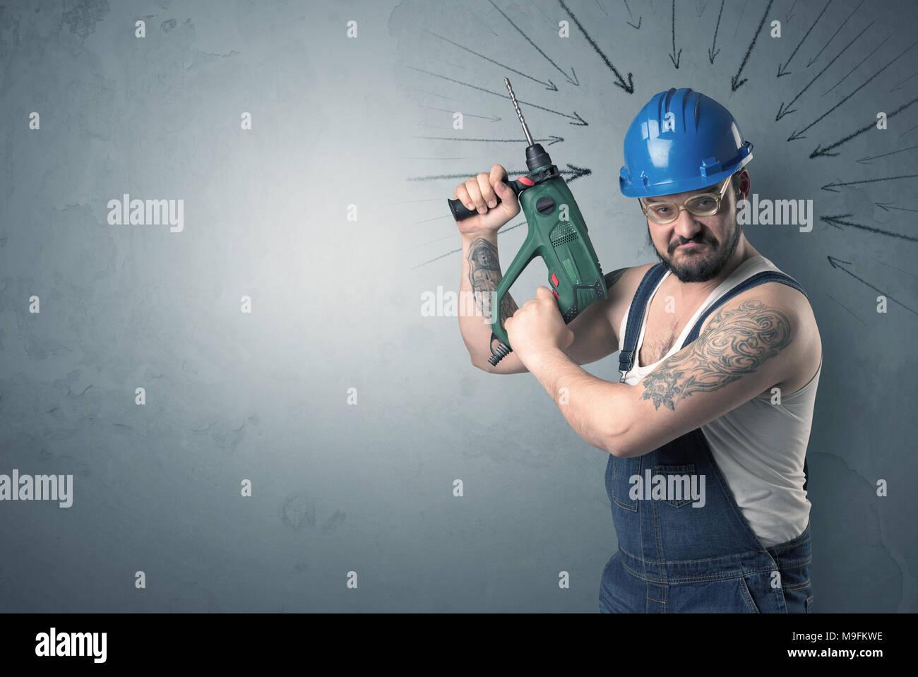 Working man with tools in his hand and arrows above his head Stock ...