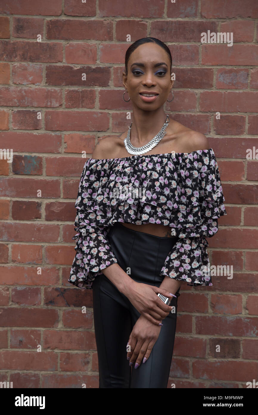 West Indian woman posing clothes Stock Photo - Alamy