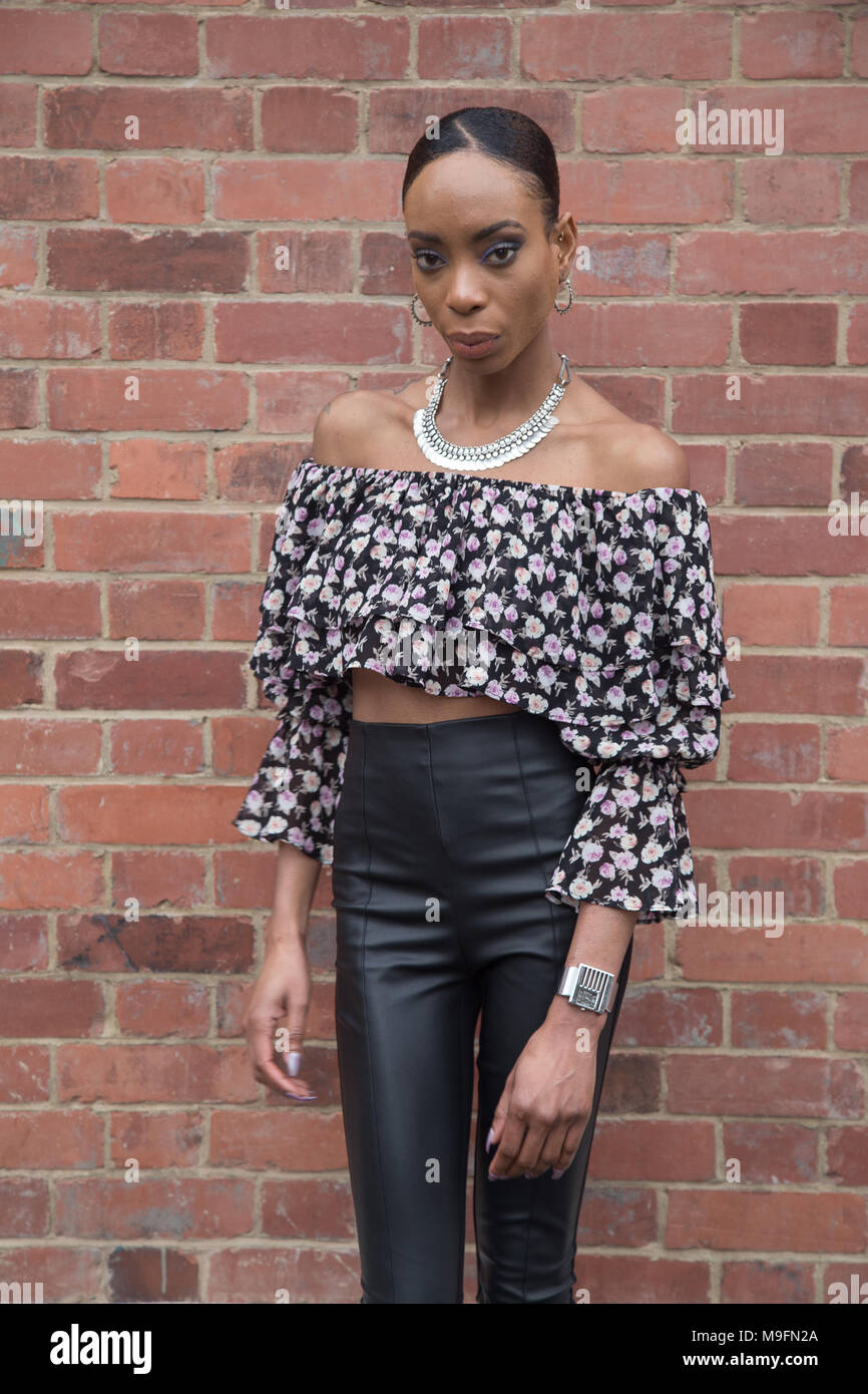 West Indian woman posing clothes Stock Photo - Alamy