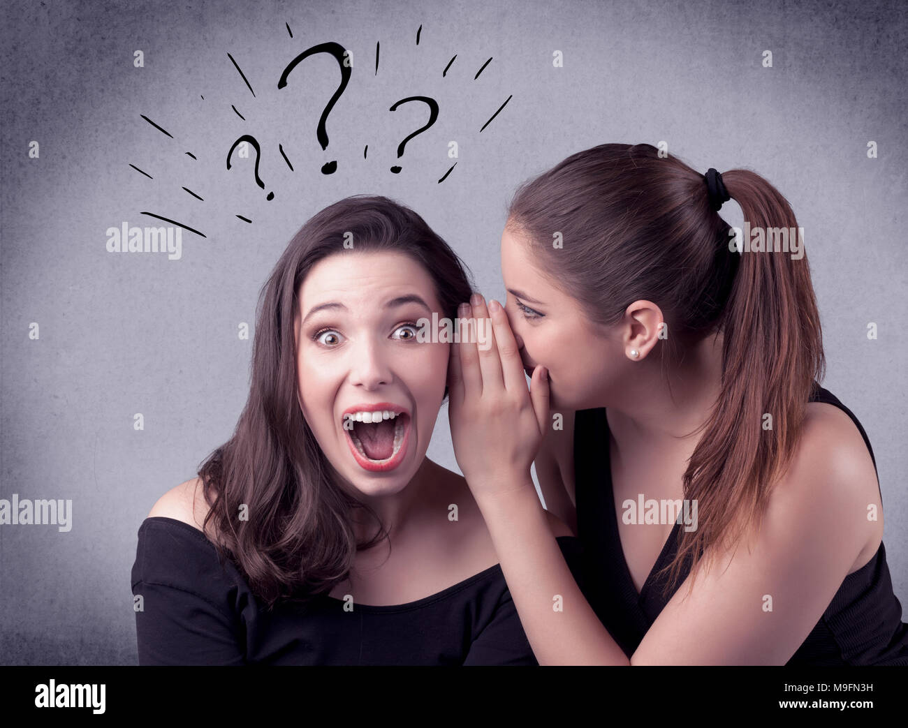 A teenager girl looking confused with drawn question marks above the ...