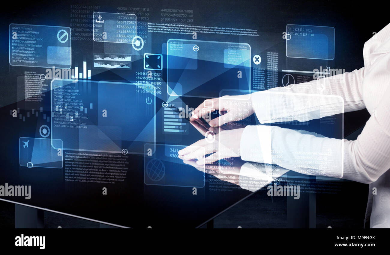Man pressing technology smart table interface with blue graphs Stock ...