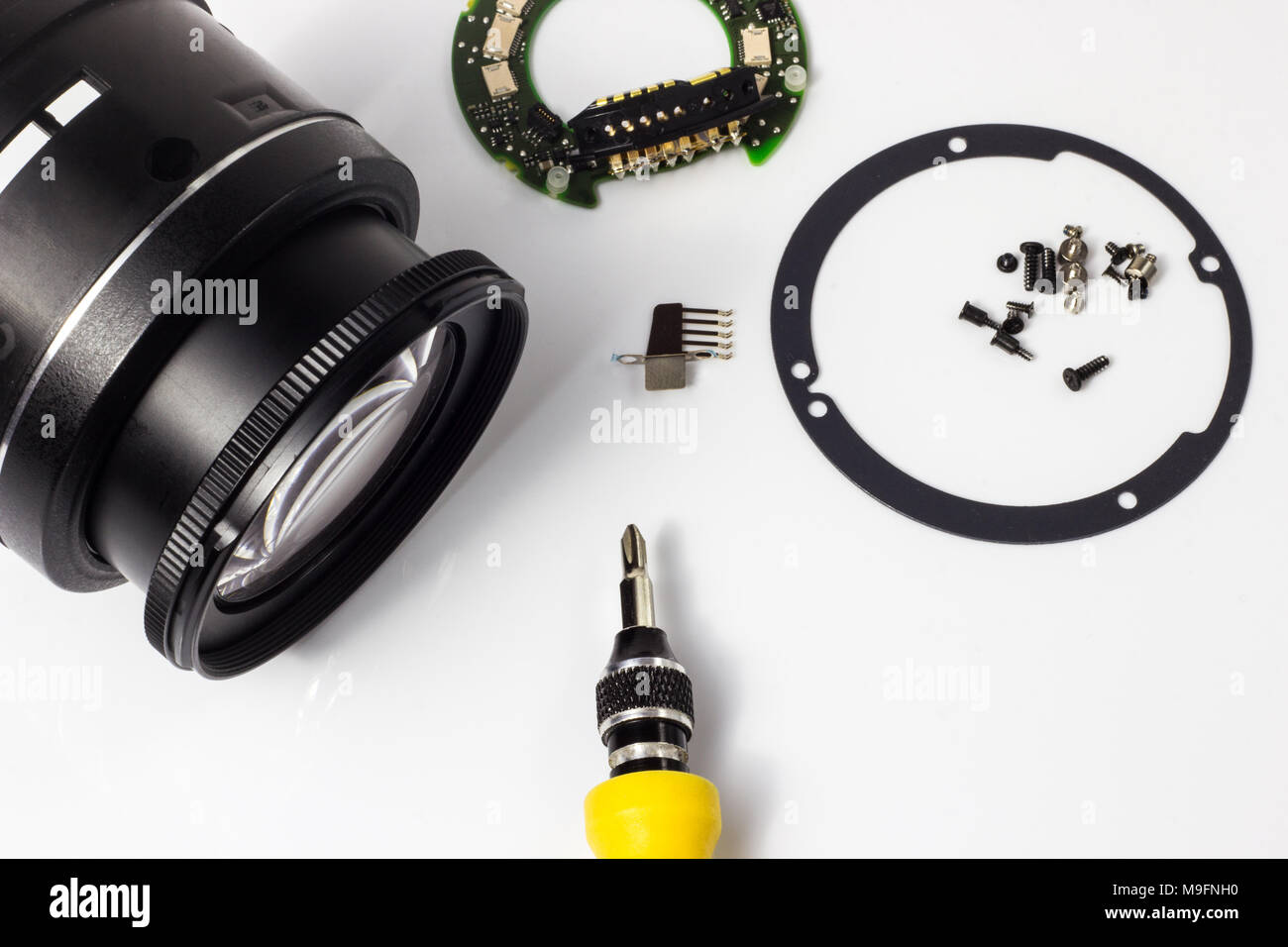 Disassembly and repair of a photo lens, cleaning the glass Stock Photo ...