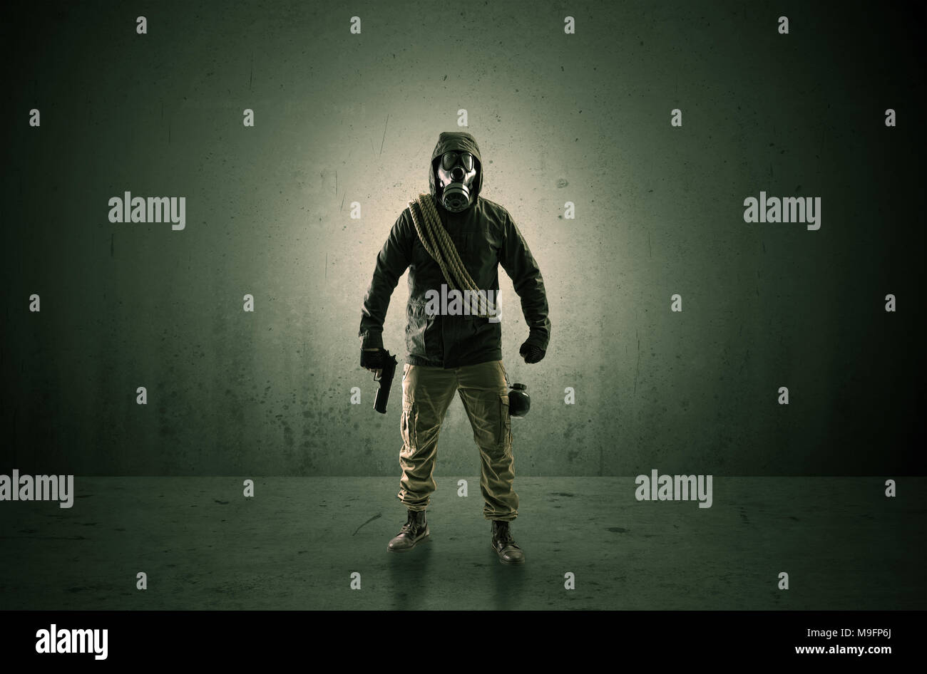 Bad agent in a dark room with arms on his hand and gas mask Stock Photo ...