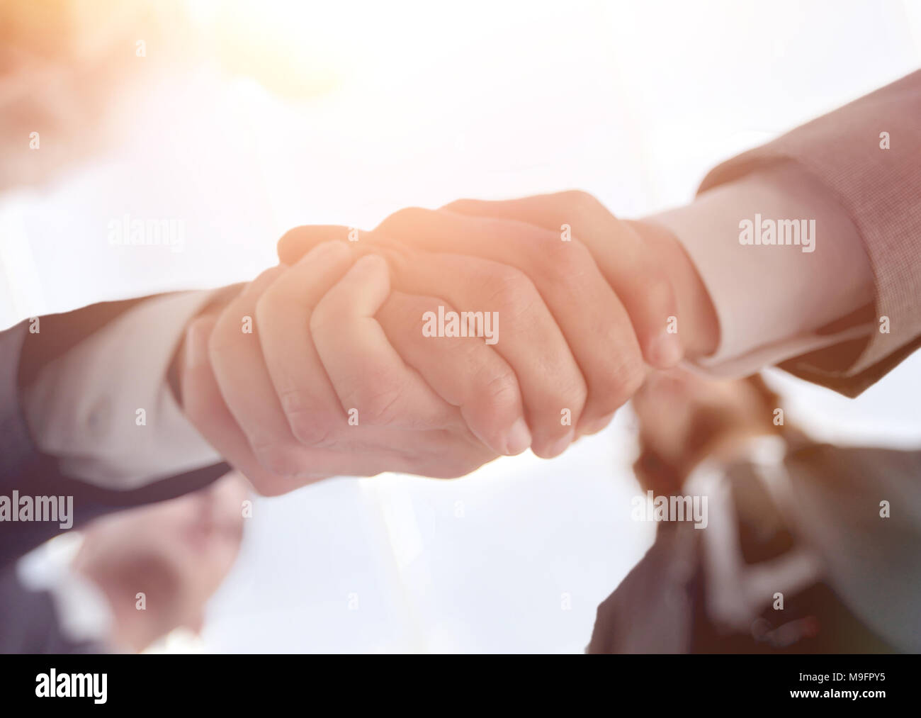 bottom view.business handshake.the concept of partnership Stock Photo ...