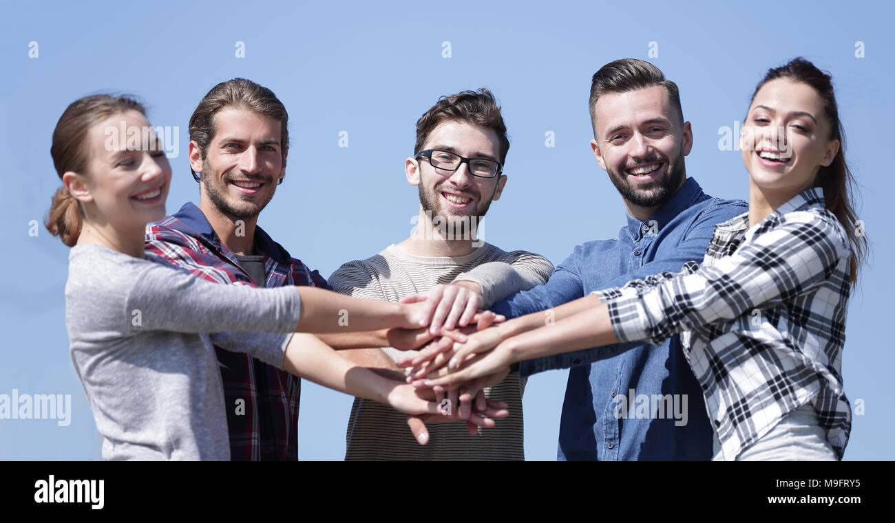 team of young people shows their unity Stock Photo - Alamy